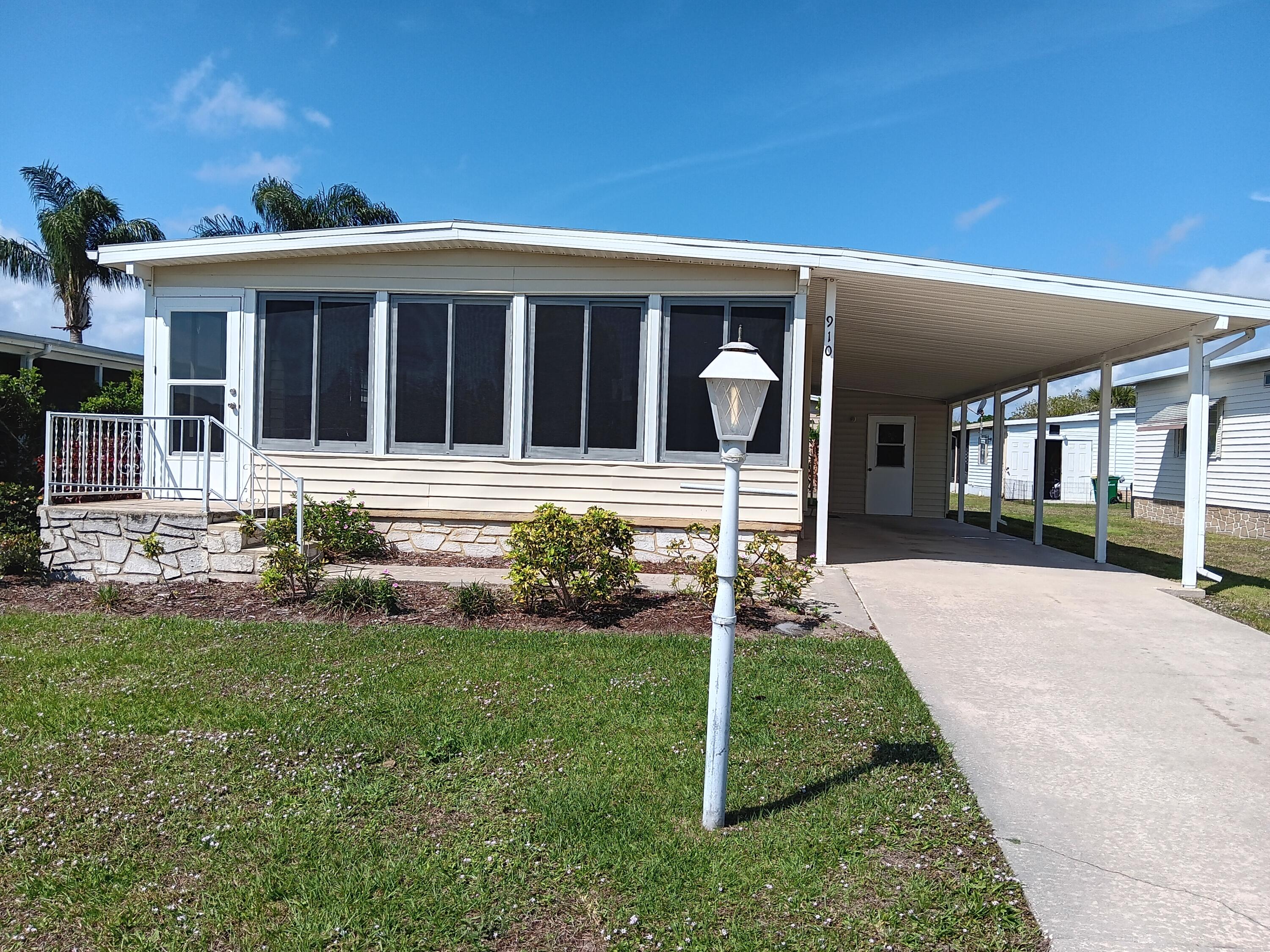 910 Wren Circle, Barefoot Bay, FL 32976 | Compass