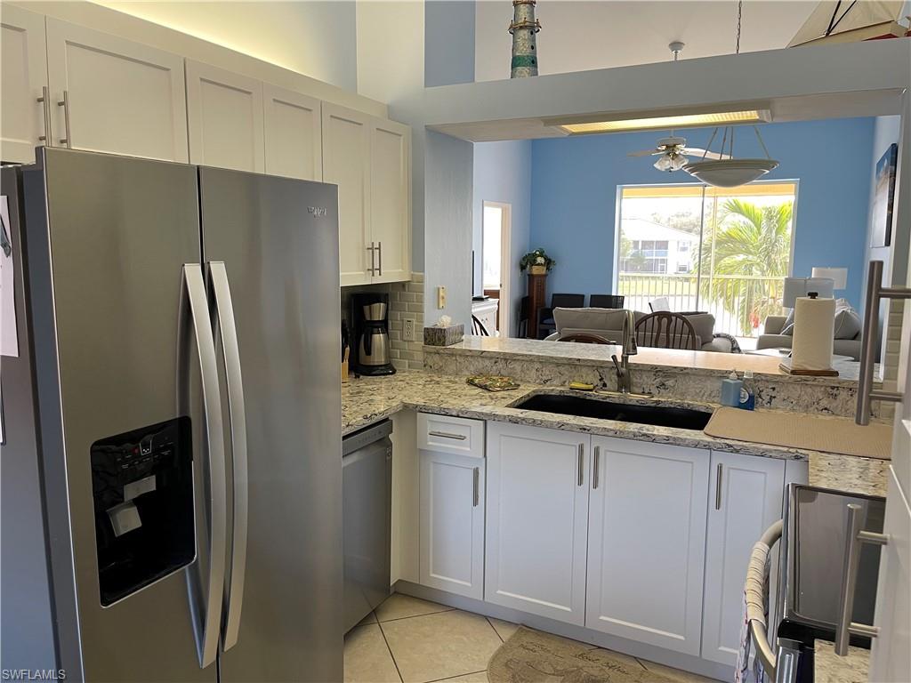 380 Robin Hood Circle, Unit 201, Naples, FL 34104 | Compass