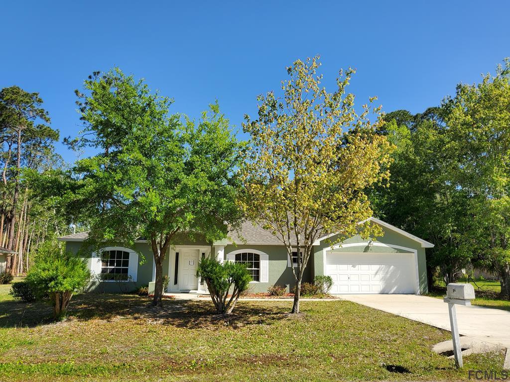 15 Poinsettia Lane, Palm Coast, FL 32164 | Compass