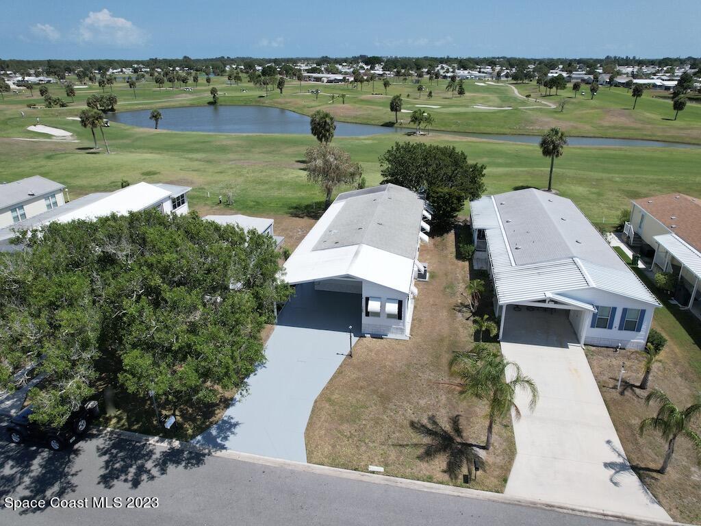 1106 Barefoot Circle, Barefoot Bay, FL 32976 | Compass